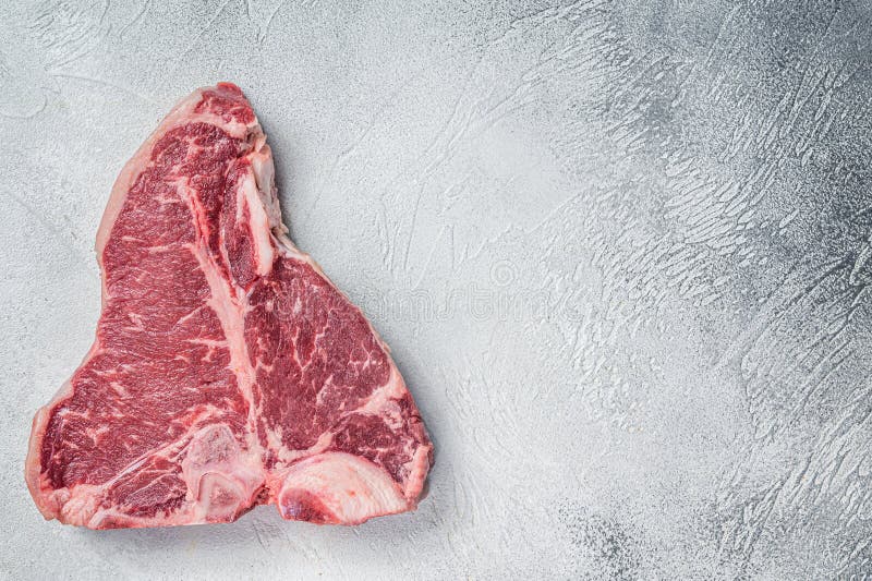 Porterhouse T-bone Raw Beef Meat Steak. White Background. Top View ...