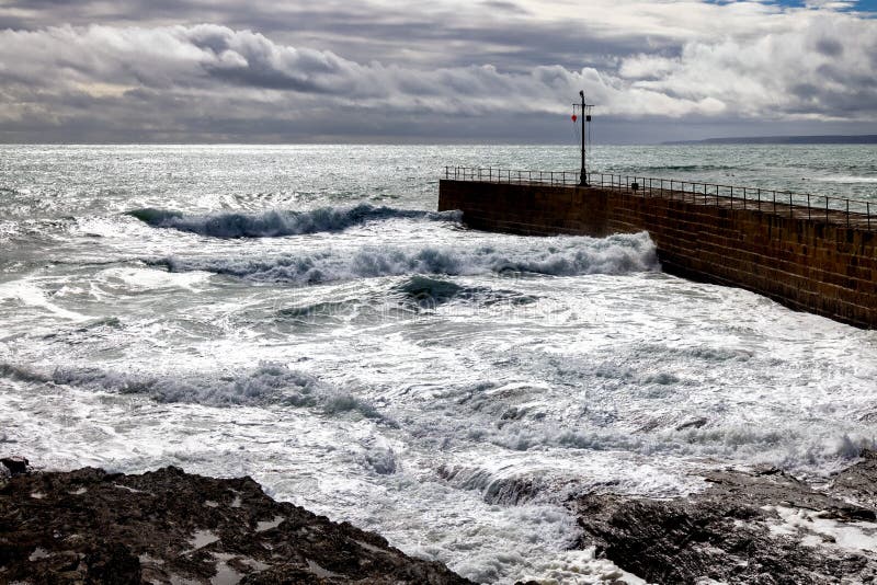Stormy Weather by the Harbour Wall in Porthleven, Cornwall on May 11 ...