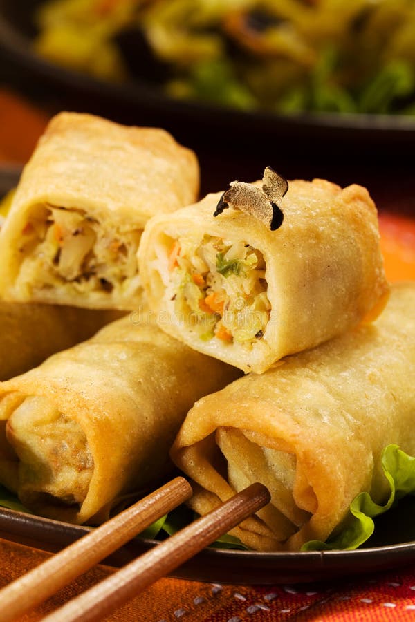 Portion Baked Spring Rolls with Vegetables and Rice on a Plate Stock ...