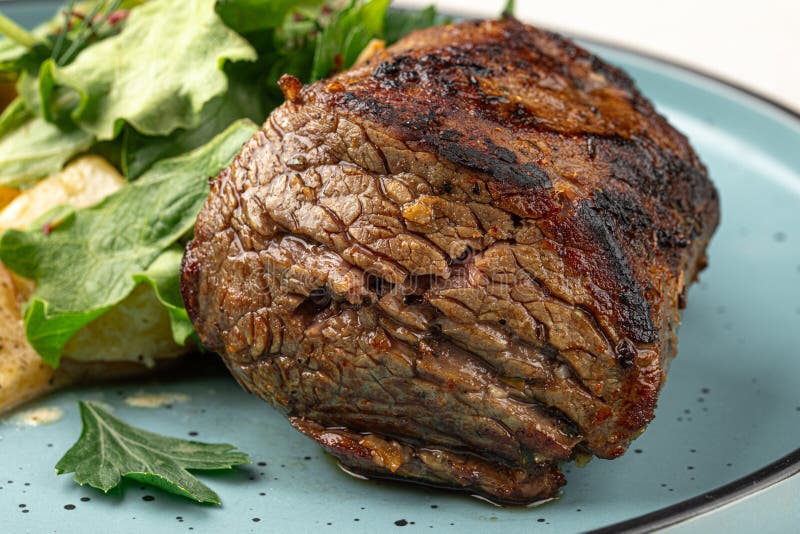 Portion of Beef Mignon Steak with Vegetables Stock Photo - Image of ...