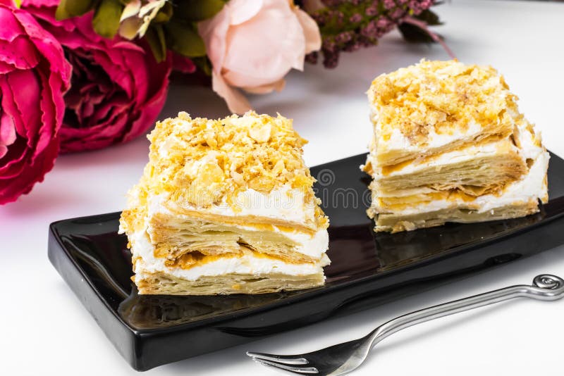 Portion Cake of Puff Pastry with Vanilla Butter Cream Stock Image ...