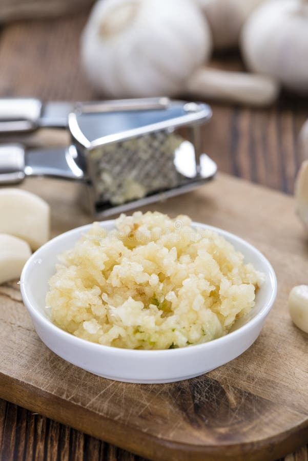 Portion of Crushed Garlic stock image. Image of clove - 48681609