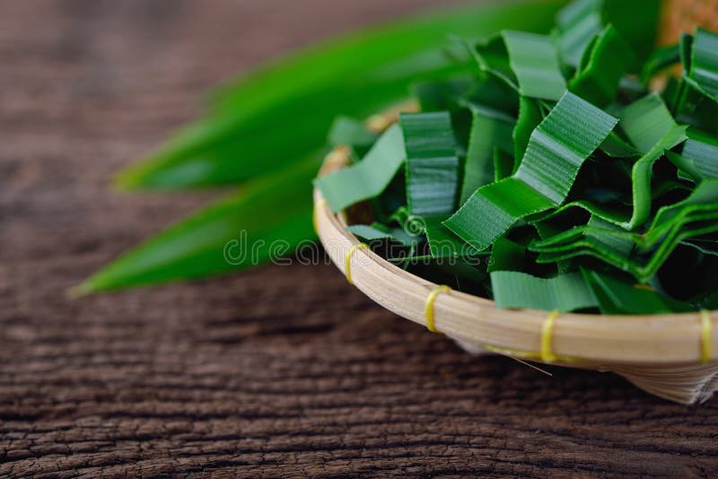 Portion Cut Pandan Leaves in Bamboo Basket and on Wooden Table Stock ...