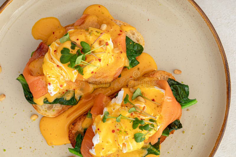 Portion of Eggs Benedict Toast with Salmon Stock Image - Image of ...