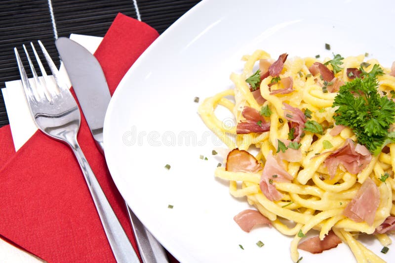 Portion of Fresh Cheese Spaetzle on Black Stock Photo - Image of snack ...