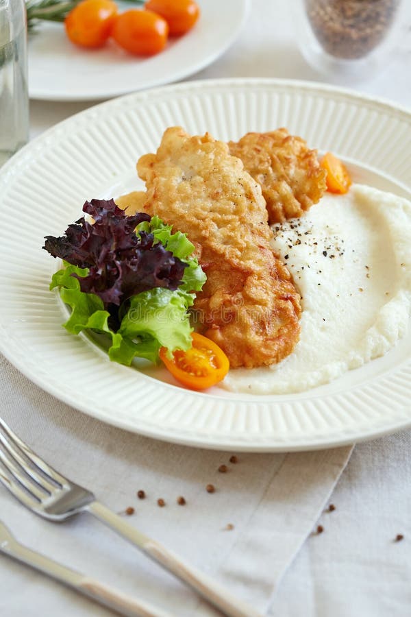 A Portion of Fried Fish with Cauliflower Puree Stock Image - Image of ...