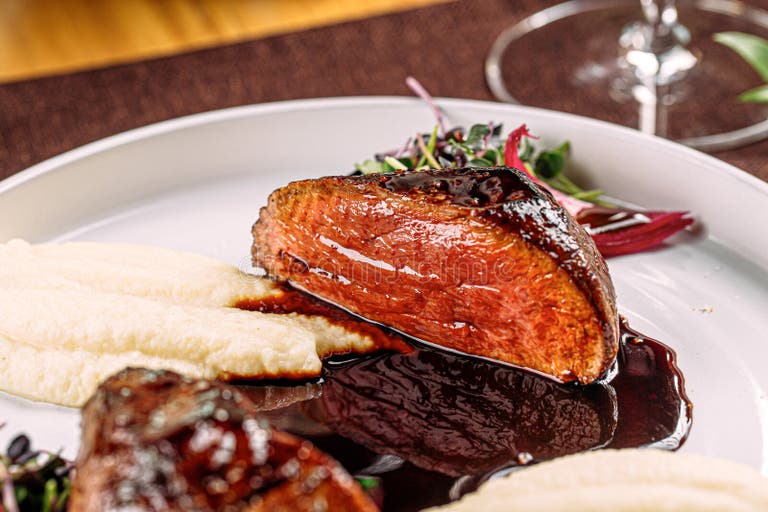 Portion of Grilled Beef Steak with Mashed Potato Stock Photo - Image of ...