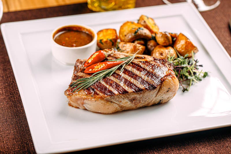 Portion of Grilled Beef Steak Served Stock Photo - Image of lunch ...