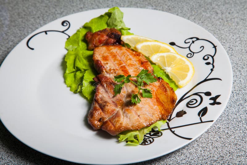 Portion of Grilled Meat and Three Parts of Lemon Stock Photo - Image of ...