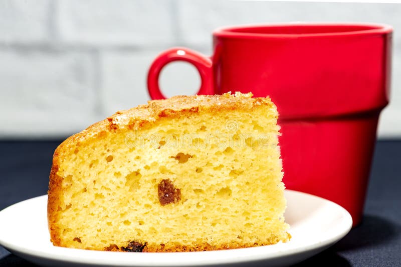 Portion of Homemade Cake with Cup of Coffee Behind Stock Photo - Image ...