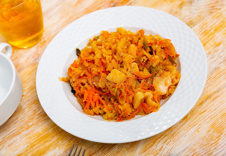 Portion of Stewed Cabbage on Wooden Table Stock Photo - Image of meal ...