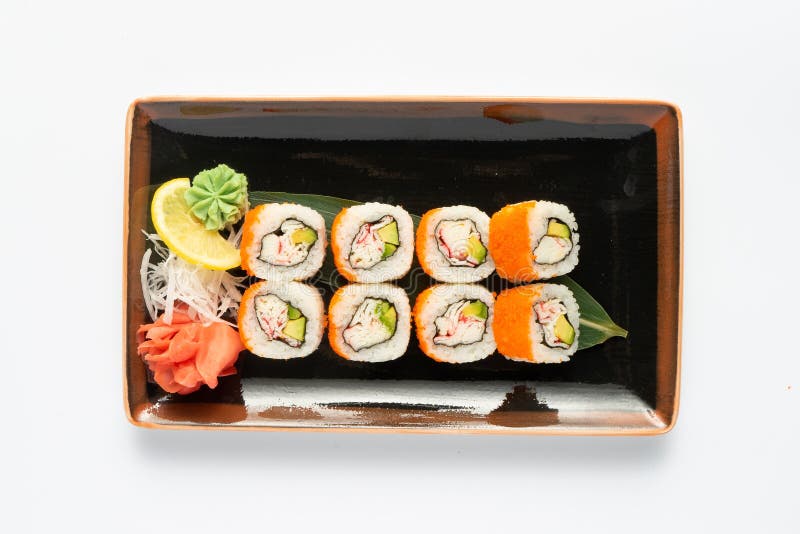 A Portion of Maki Sushi with an Assortment of Japanese Side Dishes in a ...