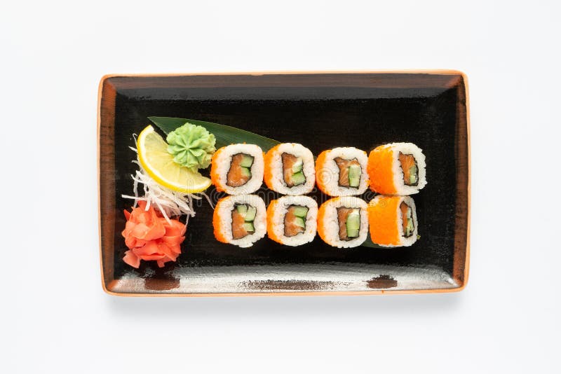 A Portion of Maki Sushi with an Assortment of Japanese Side Dishes in a ...