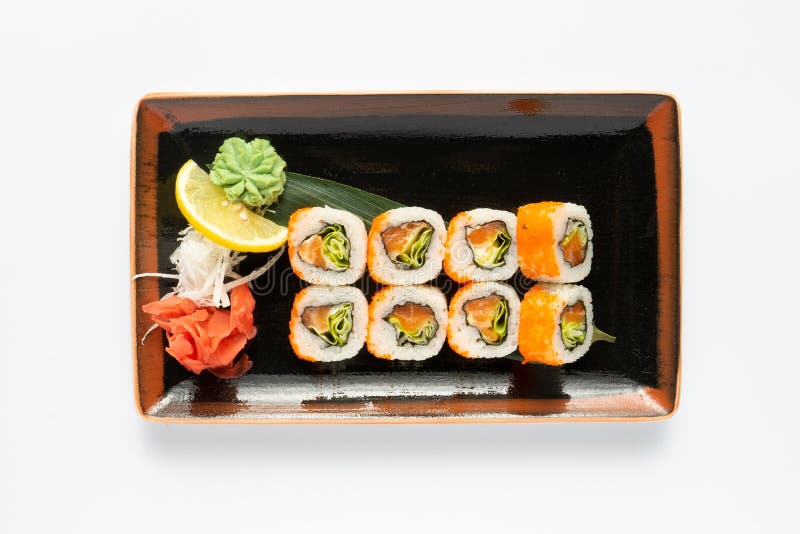 A Portion of Maki Sushi with an Assortment of Japanese Side Dishes in a ...