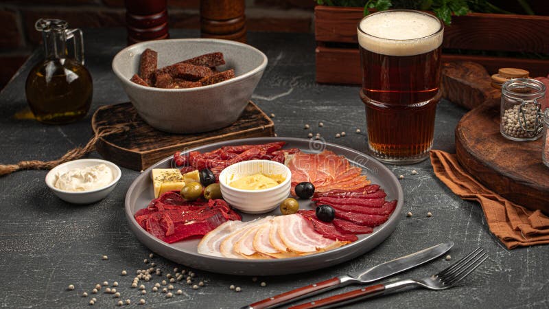 Portion of Meat Appetizer Platter with Beer Stock Image - Image of ...