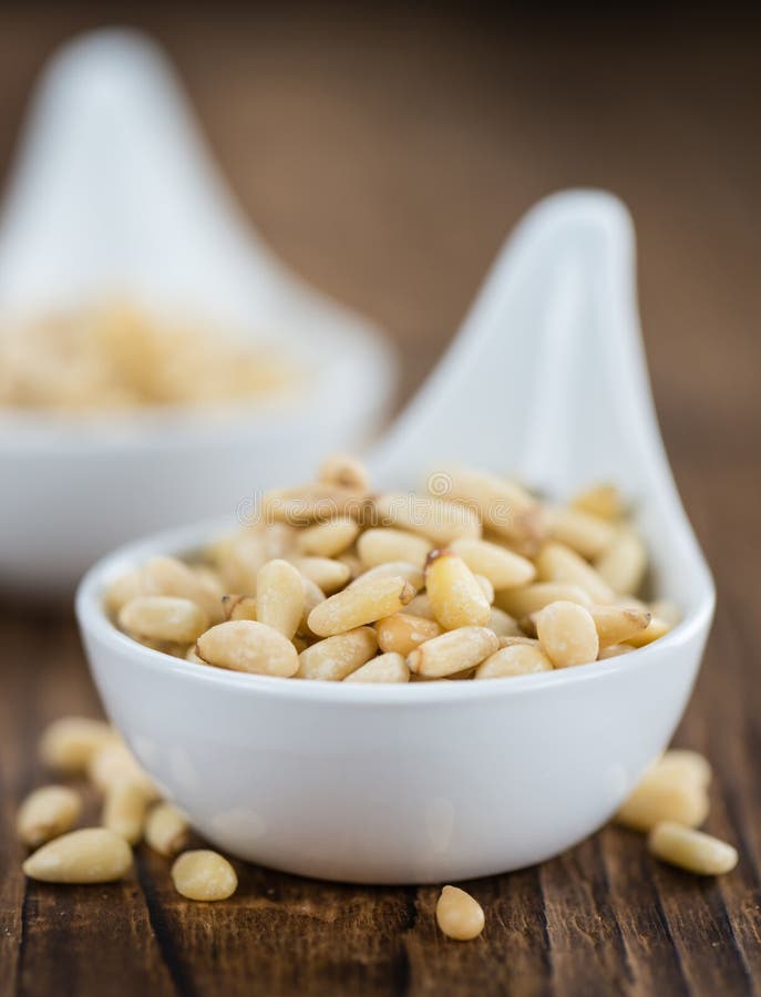Portion of Pine Nuts stock image. Image of nuts, traditional - 96592543