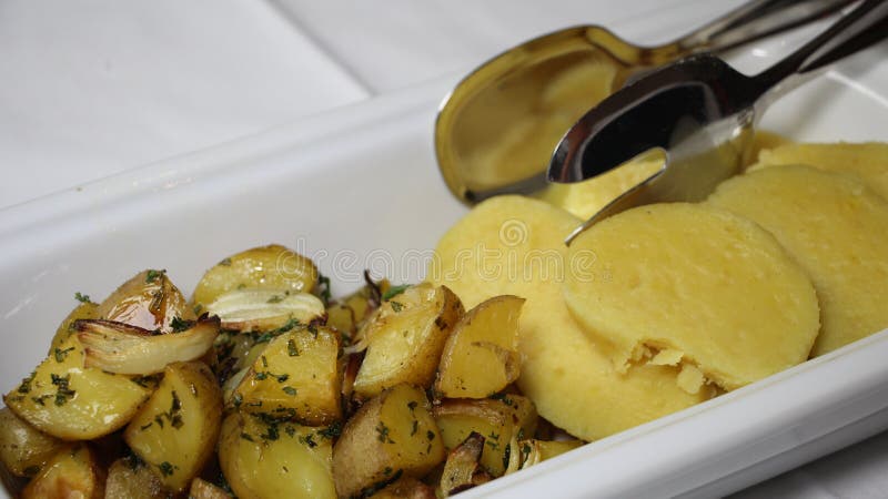Portion Potatoes of Two Types on One Plate. Rectangular White Plate ...