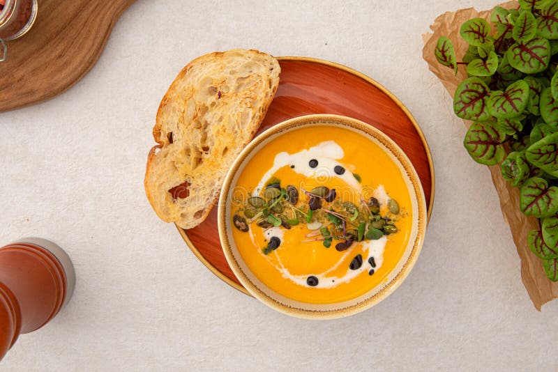 Portion of Pumpkin Soup Puree with Cream Stock Image - Image of meal ...