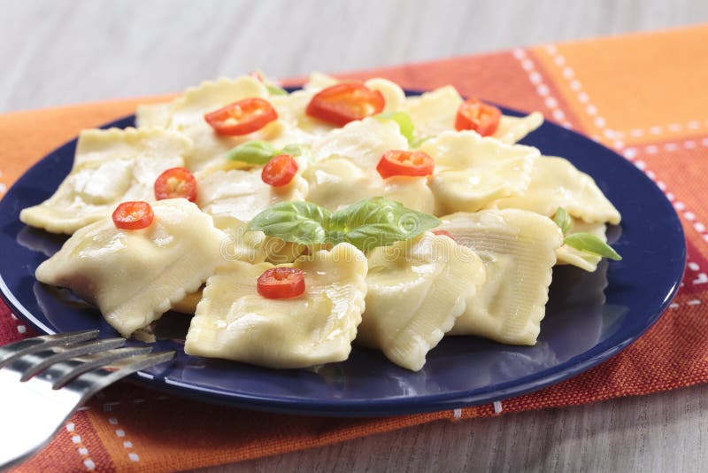 Portion of Ravioli with Red Pepper Stock Photo - Image of cheese, dish ...