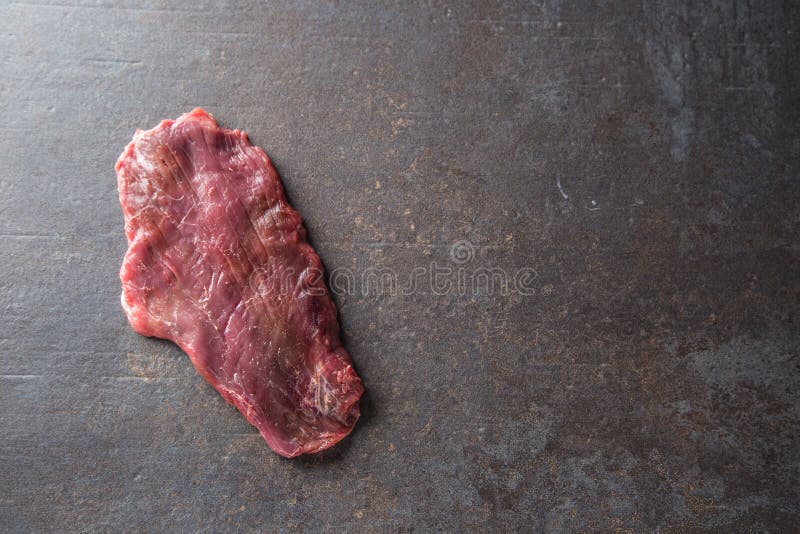 Portion of Raw Beef Flank Steak on Butcher Board Stock Photo - Image of ...