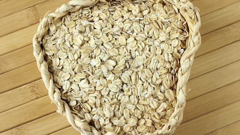 Portion of Raw Rolled Oats Rotating in the Basket Stock Footage - Video ...