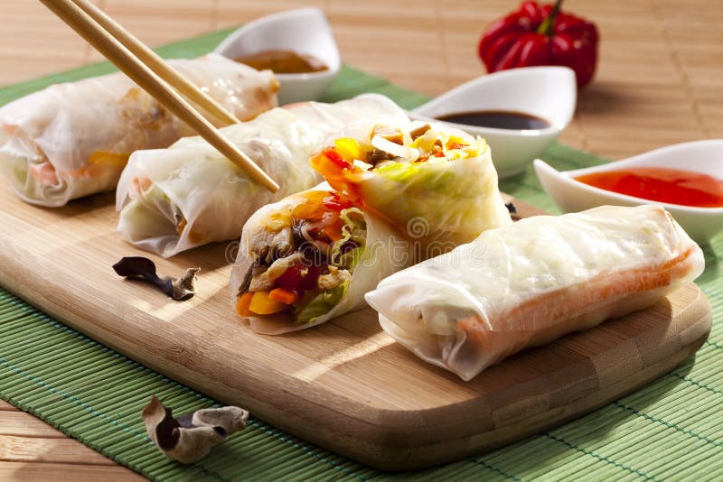 Portion of Spring Rolls on a Bamboo Board Stock Photo - Image of meal ...