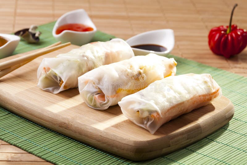 Portion of Spring Rolls on a Bamboo Board Stock Photo - Image of dinner ...