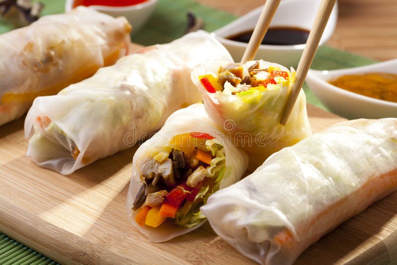 Portion of Spring Rolls on a Bamboo Board Stock Photo - Image of carrot ...