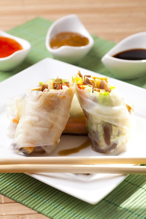 Portion of Spring Rolls on Plate Stock Photo - Image of chicken, food ...
