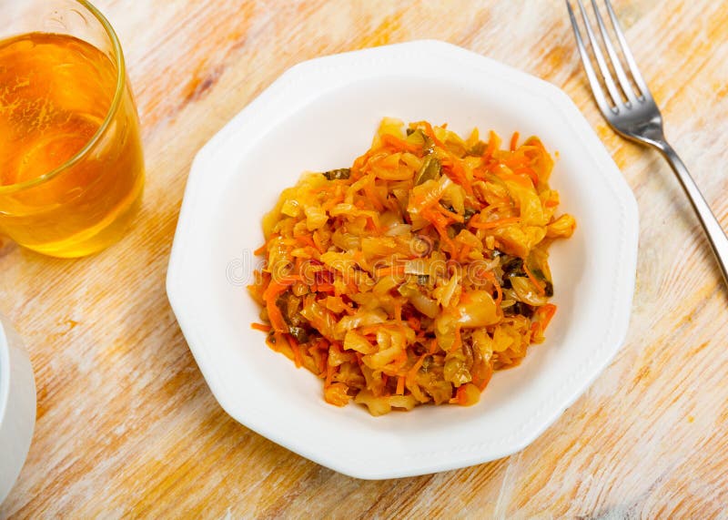 Portion of Stewed Cabbage on Wooden Table Stock Photo - Image of meal ...