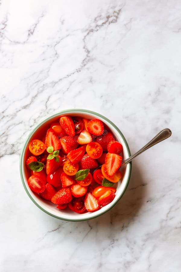 Portion of Strawberry, Tomato Cherry and Basil Leaves Salad, Top View ...