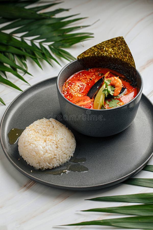 Portion of Thai Tom Yam Seafood Soup with Rice Stock Image - Image of ...