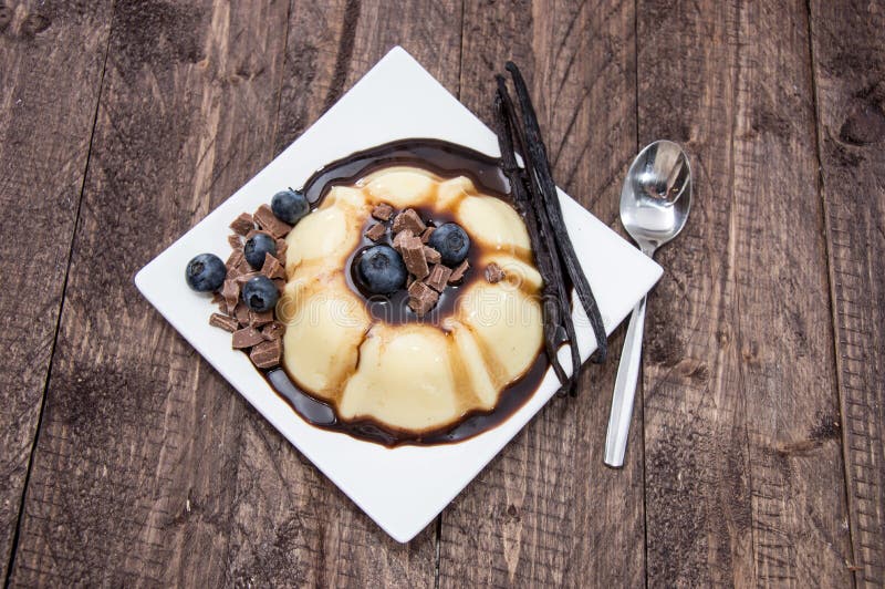 Portion of Vanilla Pudding with Sauce Stock Photo - Image of food ...
