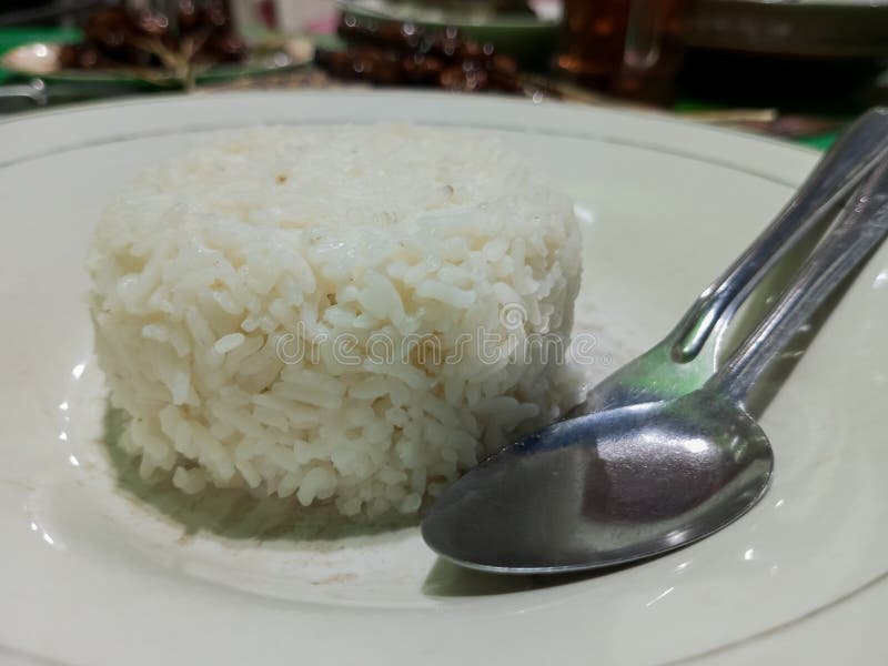 A Portion of White Rice on a Plate Stock Photo - Image of seafood ...
