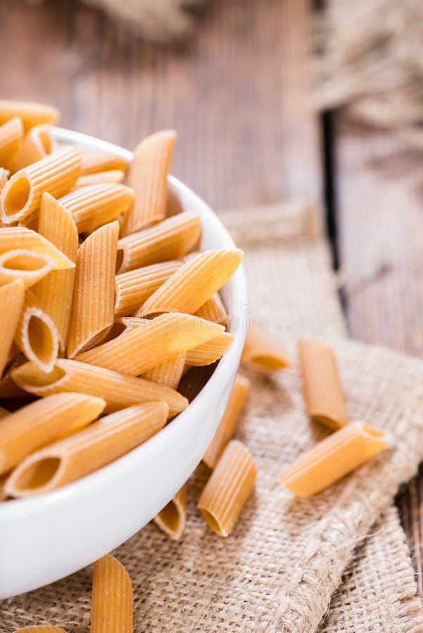 Portion of wholemeal Penne stock photo. Image of integrals - 46482130