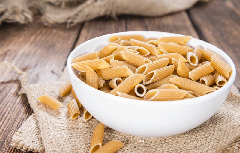 Portion of wholemeal Penne stock photo. Image of food - 46629706