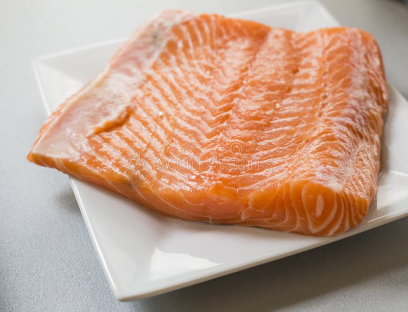 Portions of Fresh Salmon Fillet Stock Photo - Image of fillet, herbs ...