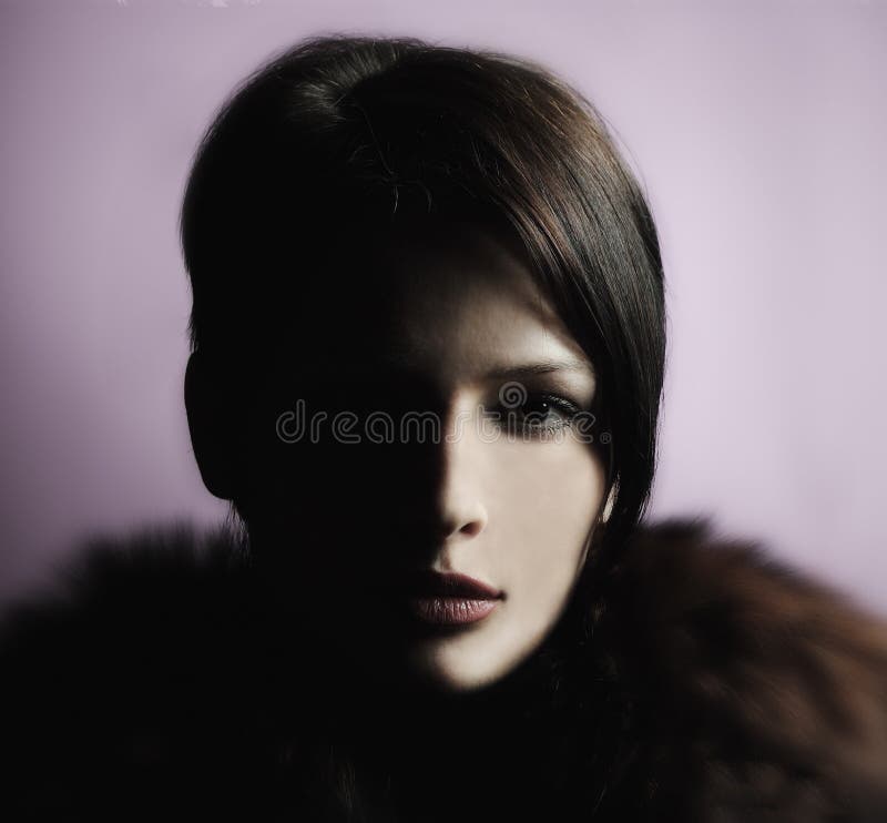 Portrain of a Girl with a Half of Face in Shadow Stock Photo - Image of ...