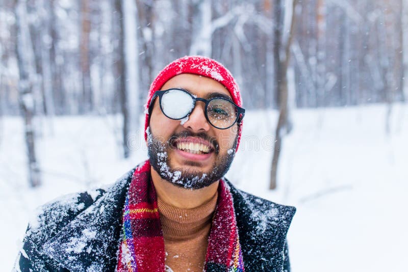 Portrain of Indian Man in Red Hat with Throwing Snow on His Face Stock ...