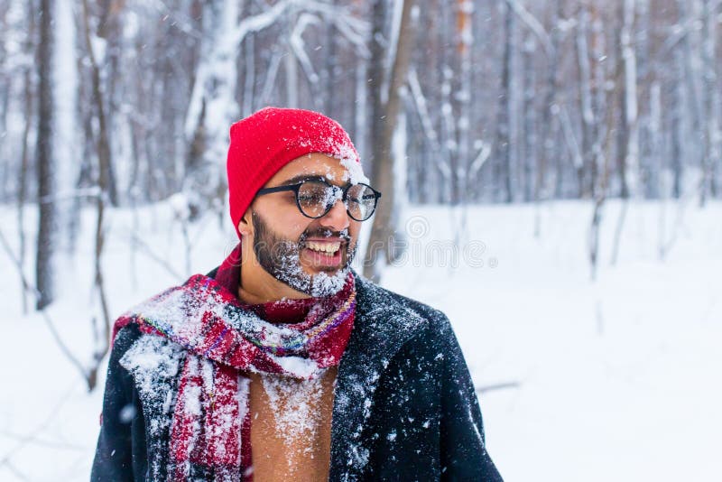 Portrain of Indian Man in Red Hat with Throwing Snow on His Face Stock ...