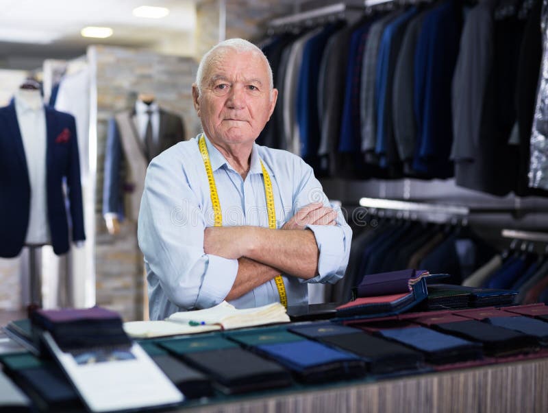 Portrait of an Accomplished Positive Tailor with Crossed Arms in ...