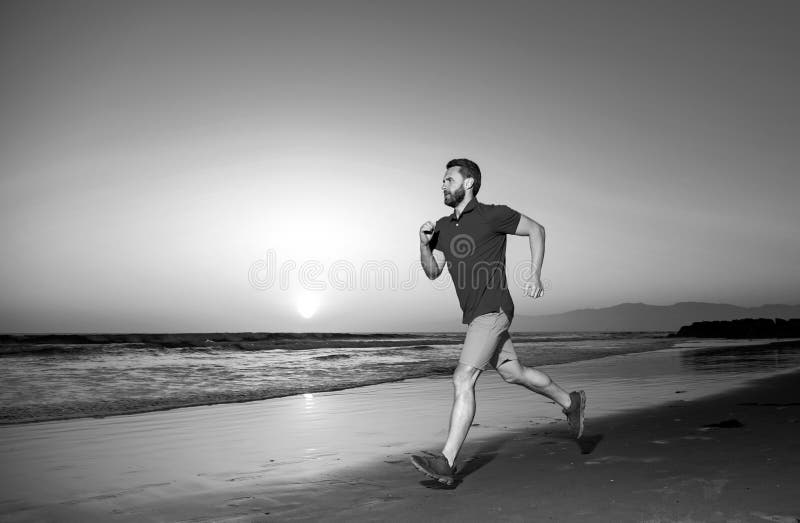 Portrait of Active Middle Age Man Jogging Running Outside by Sea. Stock ...