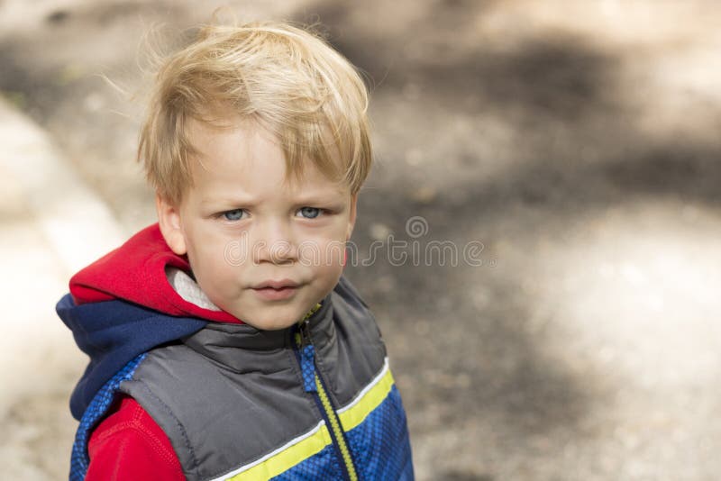 Portrait of Adorable Serious Little Kid Looking Up. Copy Space Stock ...