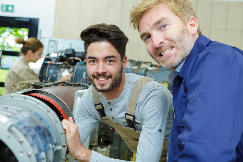 Portrait Aeronautical Engineer with Young Apprentice Stock Image ...