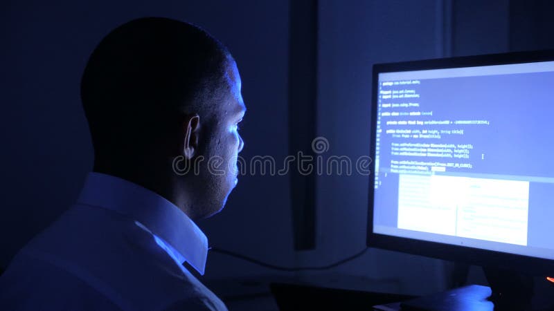 Portrait of African American Man Programmer Coding Network Security Software. Hacker Typing Code ...