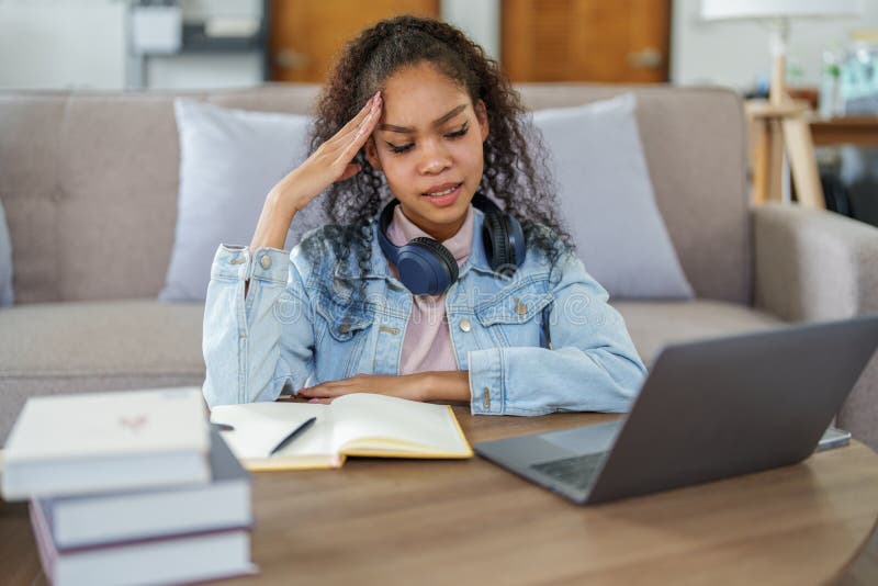African American Using Computers and Notebooks Online Stock Photo ...