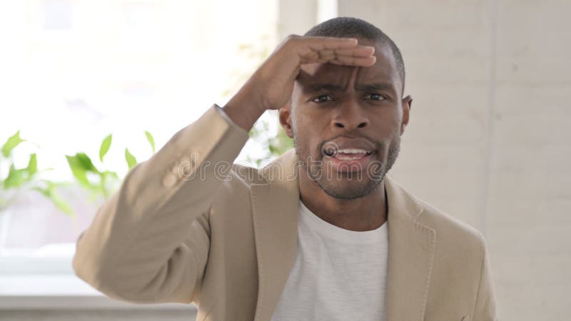 Portrait of African Man Looking Around, Searching Stock Photo - Image ...