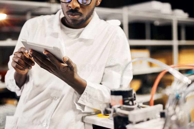 African Engineer Working with Tablet at Factory Stock Image - Image of ...