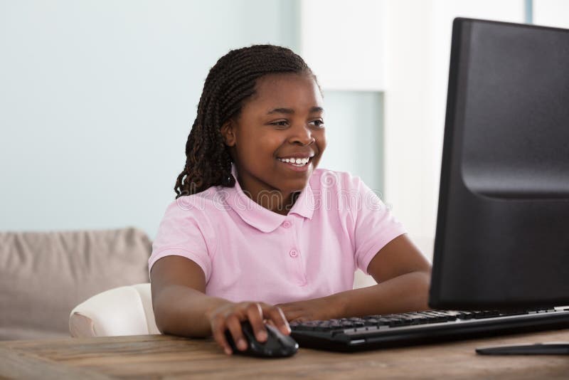 Young Girl Doing Her Homework on a Laptop Stock Image - Image of camera ...