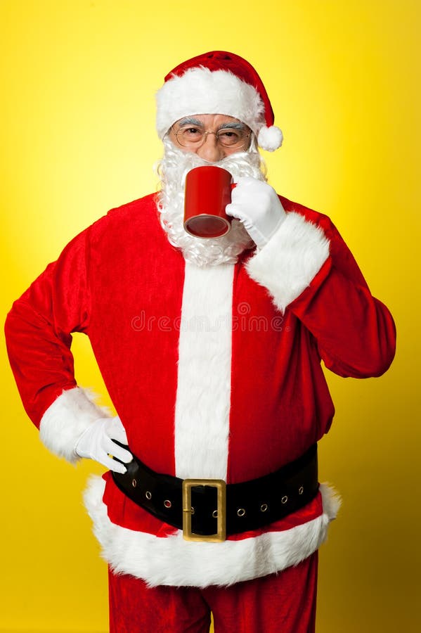 Composite Image of Santa Claus Having Coffee with Cookies Stock Photo ...